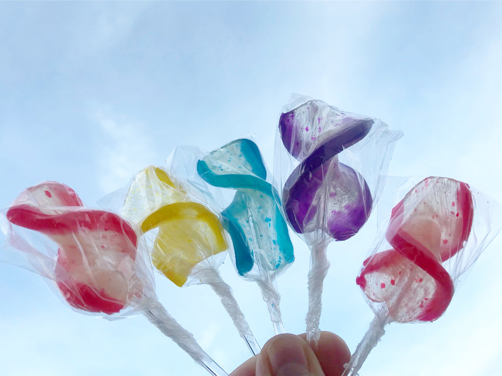 RED, RIBBON POPS from Miami Candies Sweets & Snacks – Miami Candies, LLC.